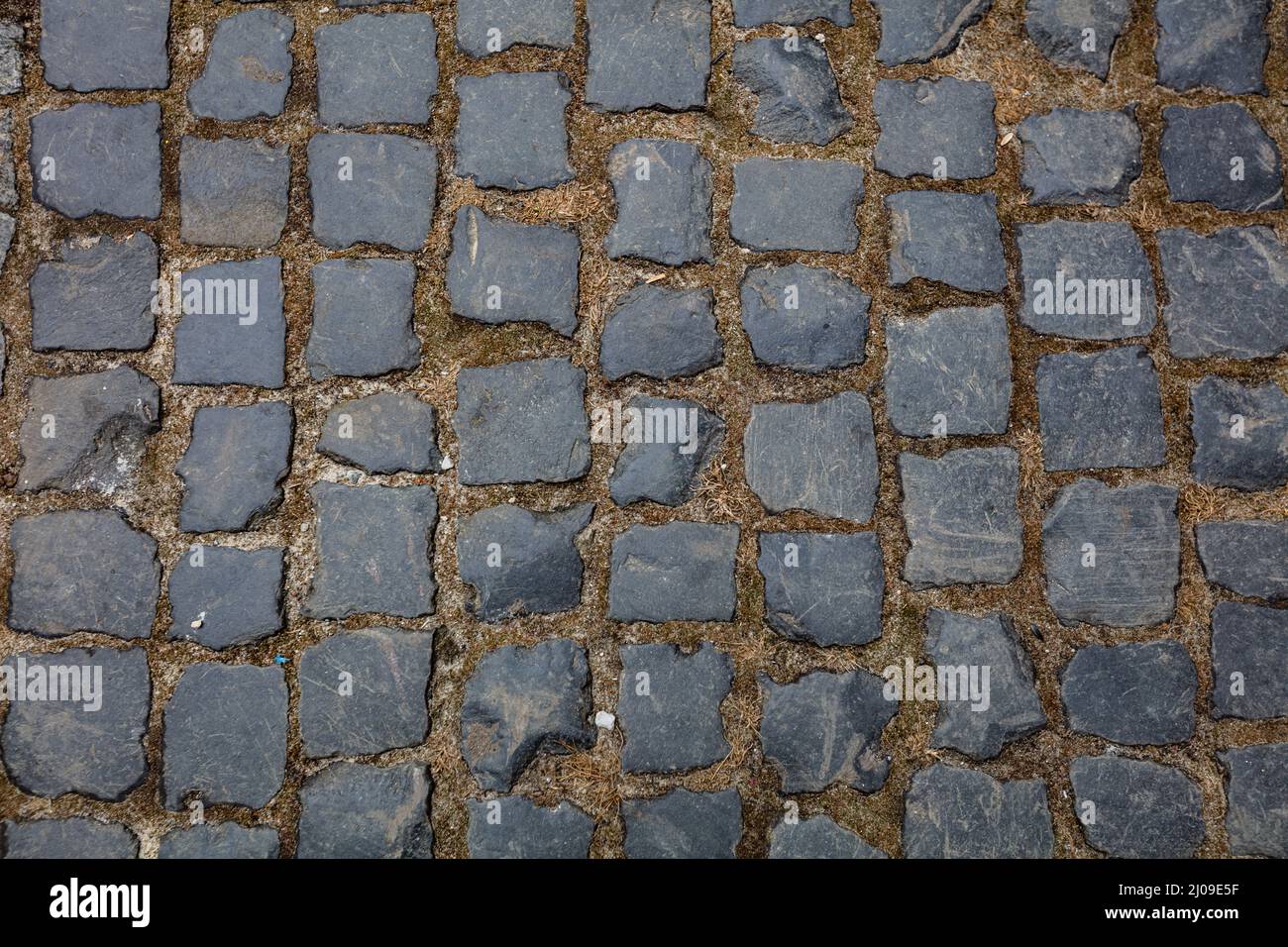 Closeup of cobblestone pavement background, texture, pattern, wallpaper Stock Photo - Alamy