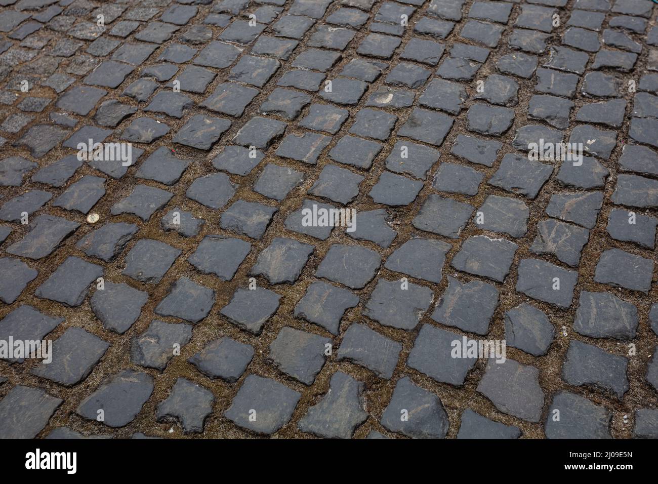 Closeup of cobblestone pavement background, texture, pattern, wallpaper Stock Photo - Alamy