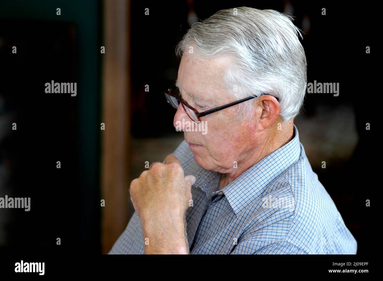 Senior white haired grandfather who has glasses Man at a family ...
