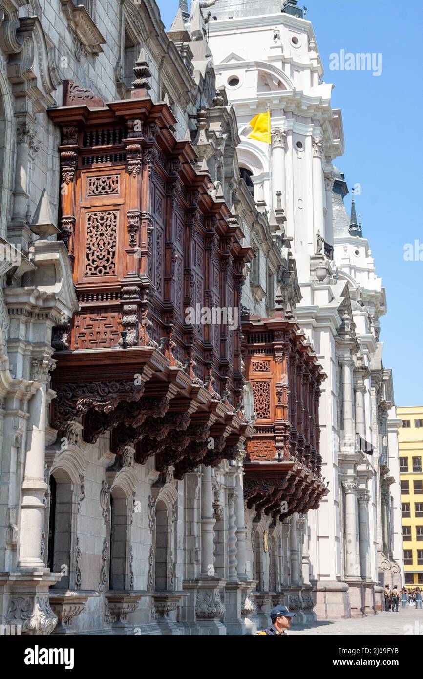Vertical shot of old historic building facades in downtown Lima, Peru ...