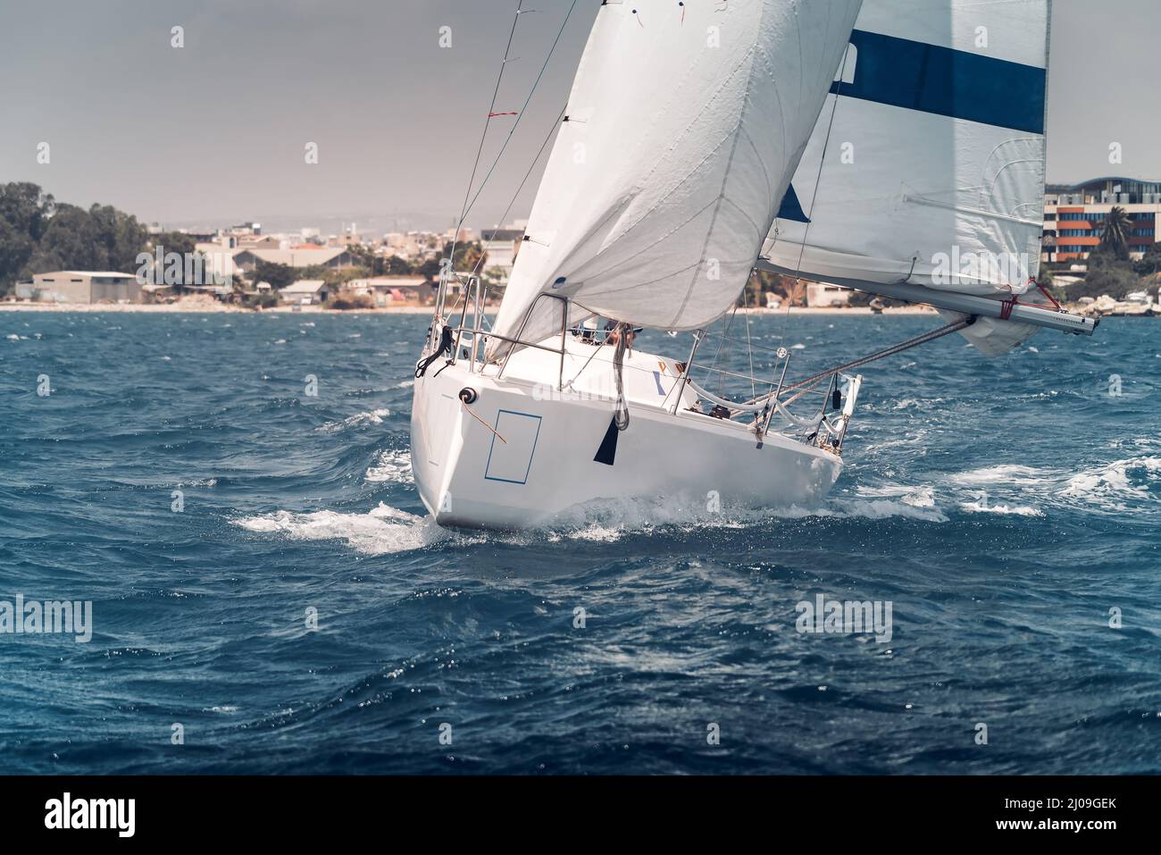 Sailing in the wind through the waves Stock Photo - Alamy