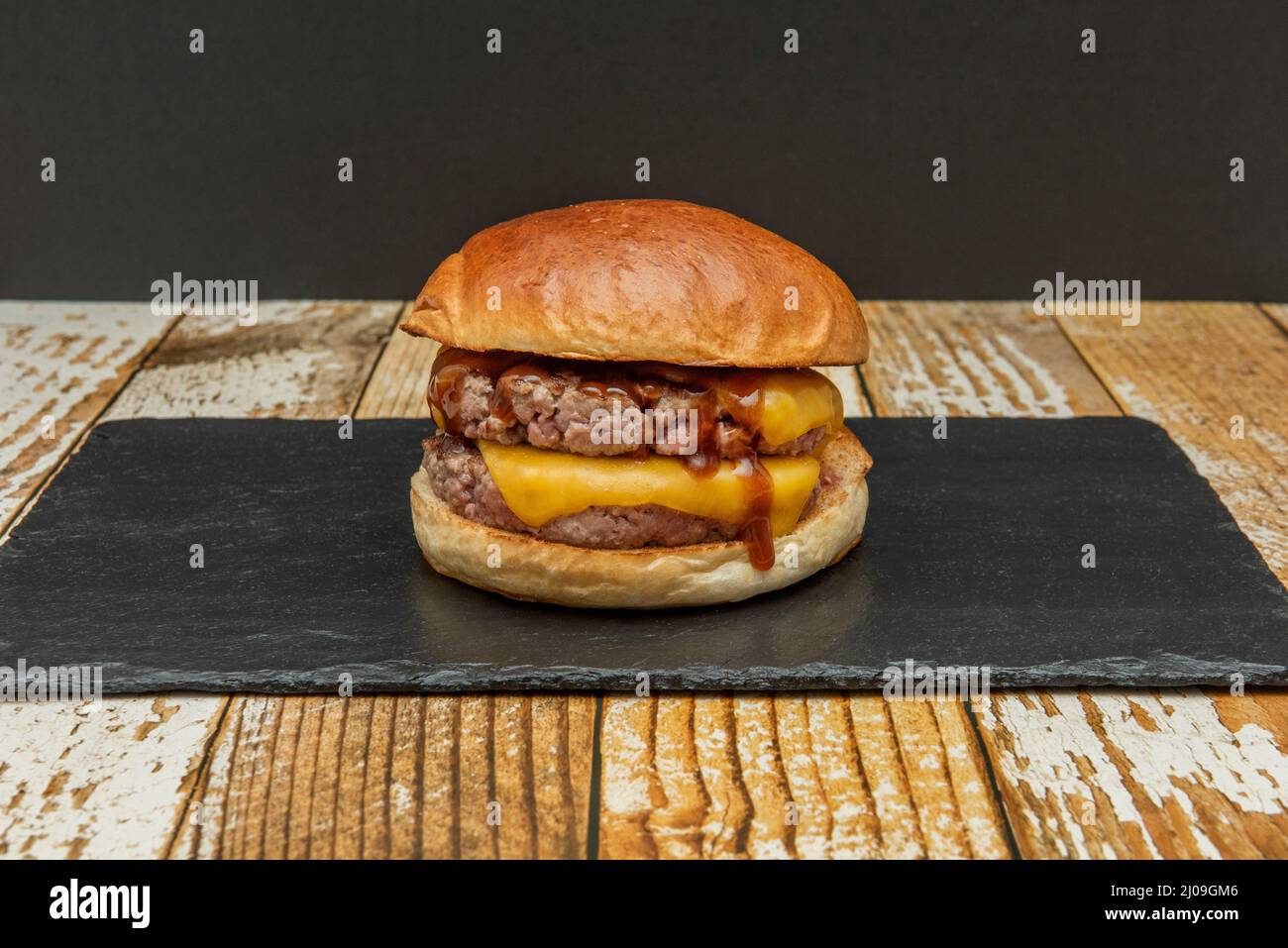 Double Cheeseburger includes two pieces of pure meat seasoned with a ...
