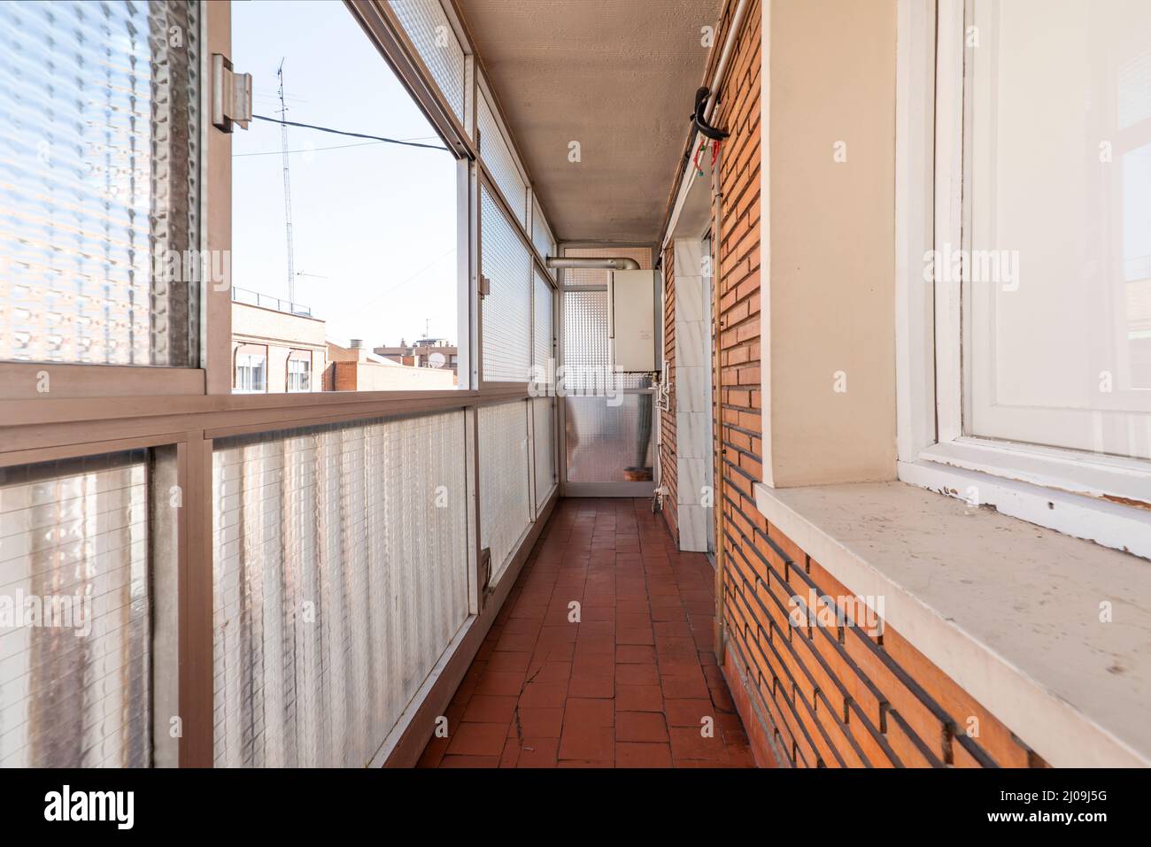 Closed terrace with aluminum and glass in a residential house are clay ...