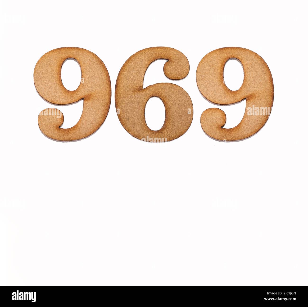 Number 969 in wood, isolated on white background Stock Photo - Alamy