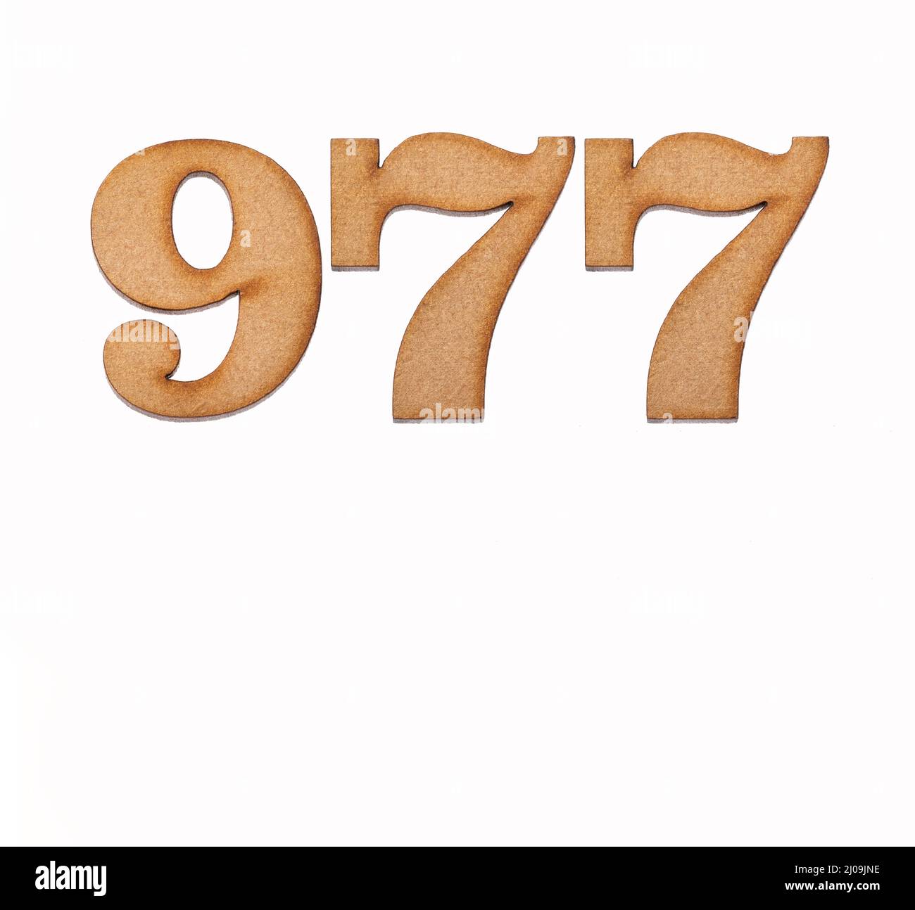 Number 977 in wood, isolated on white background Stock Photo - Alamy