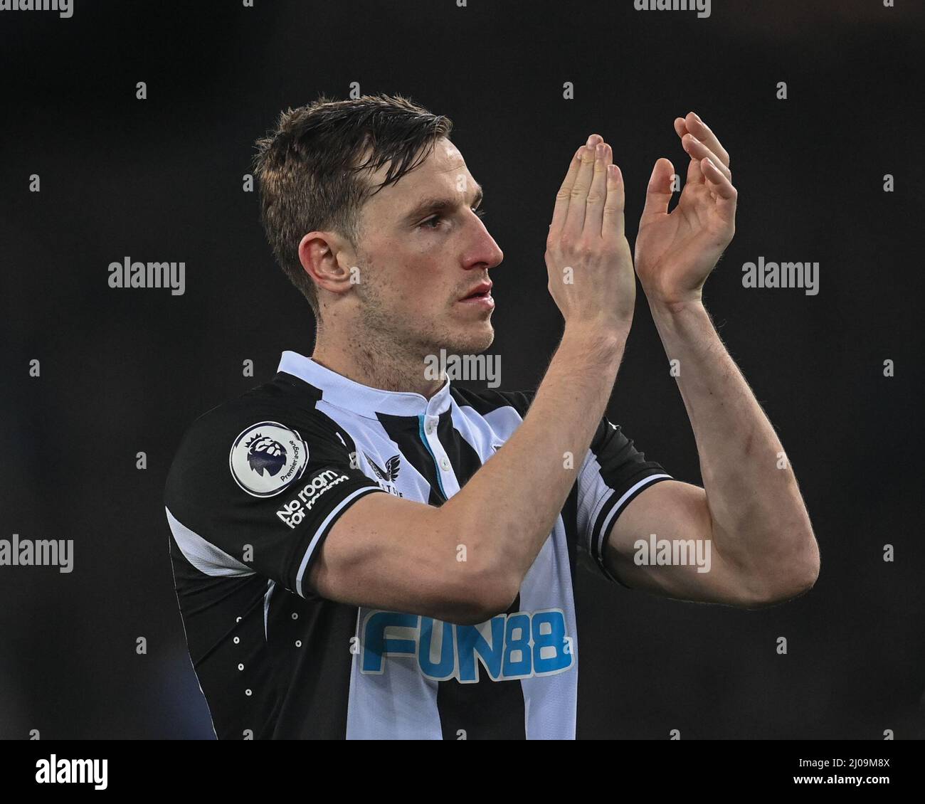 Chris Wood #20 of Newcastle United applauds the traveling fans after ...