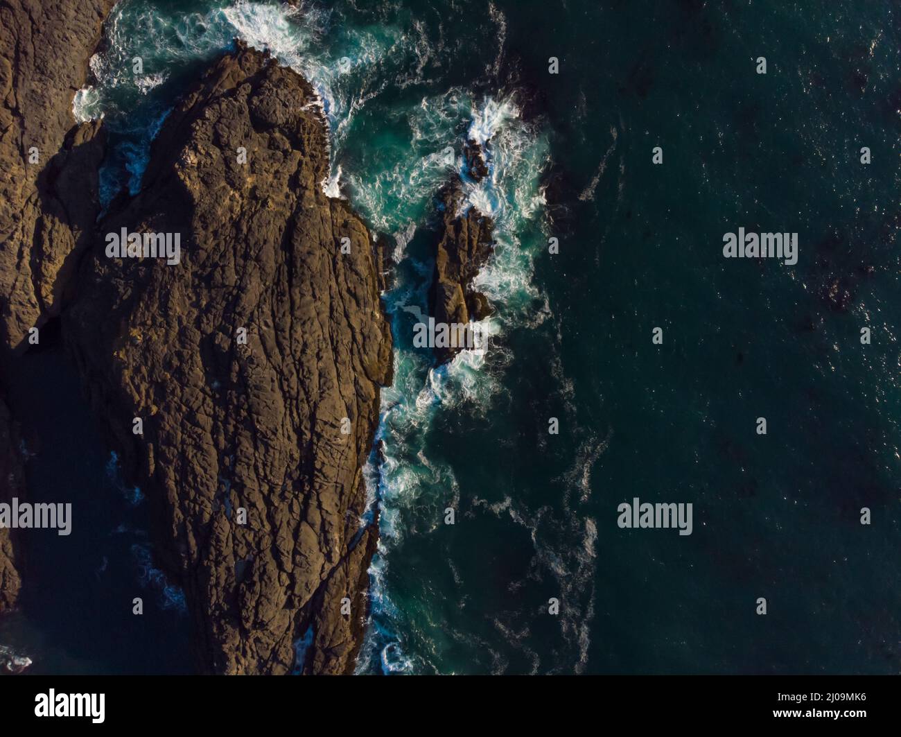 Aerial top view of ocean waves and fantastic rocky coast. Wallpaper ...