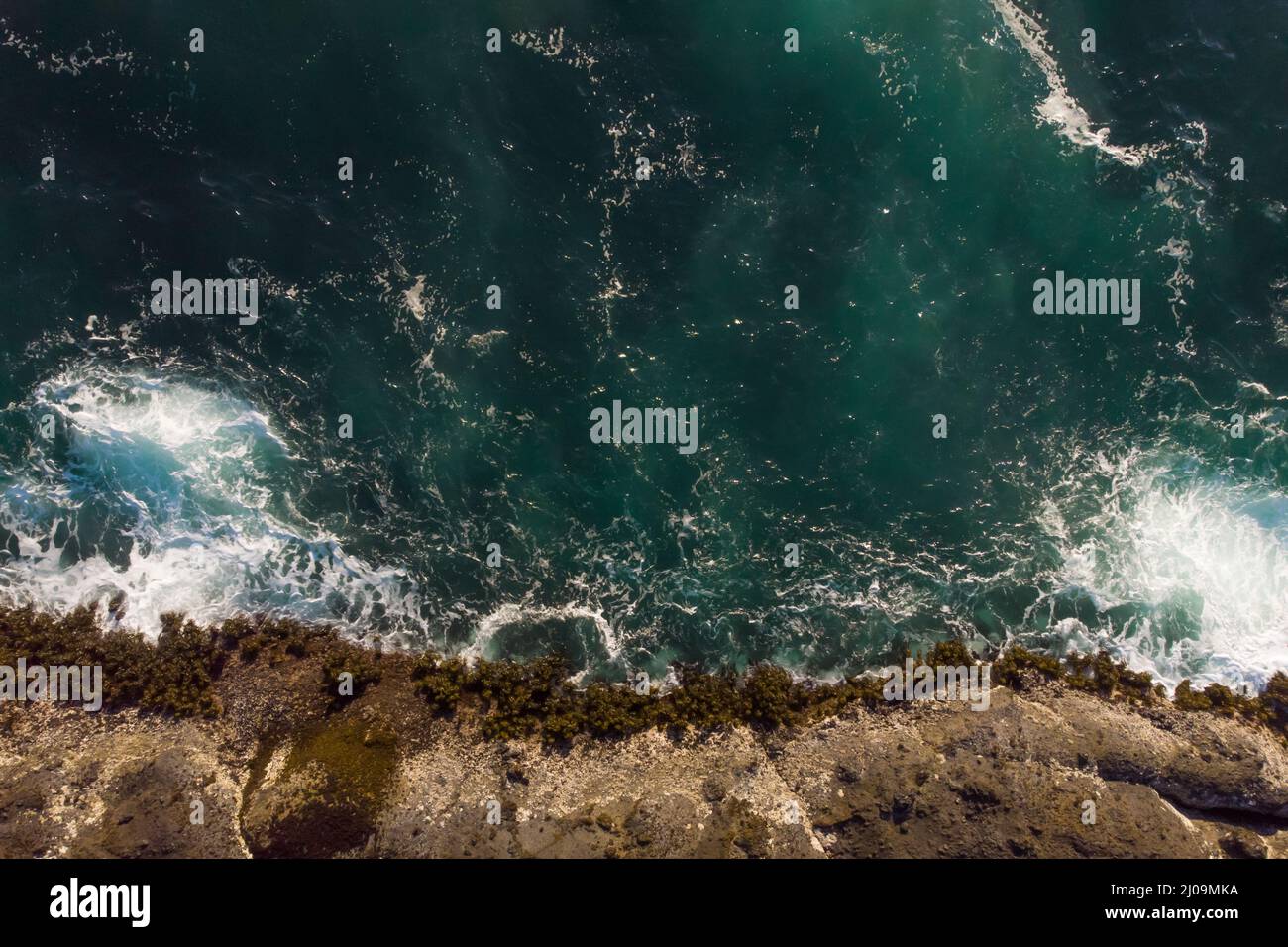 Aerial top view of ocean waves and fantastic rocky coast. Wallpaper ...