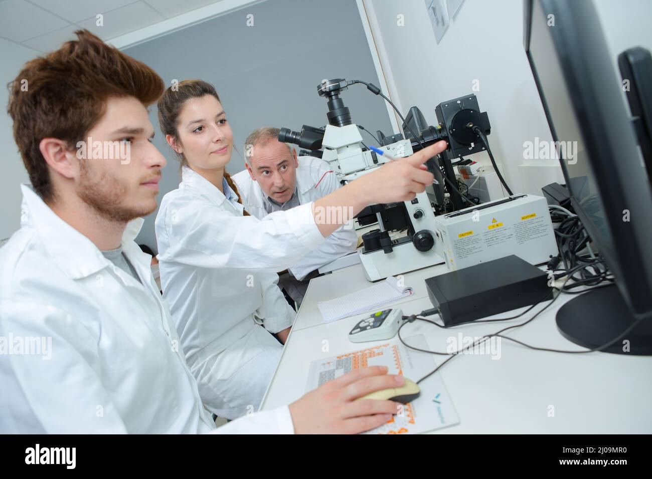 Carefully experimental science hi-res stock photography and images - Alamy