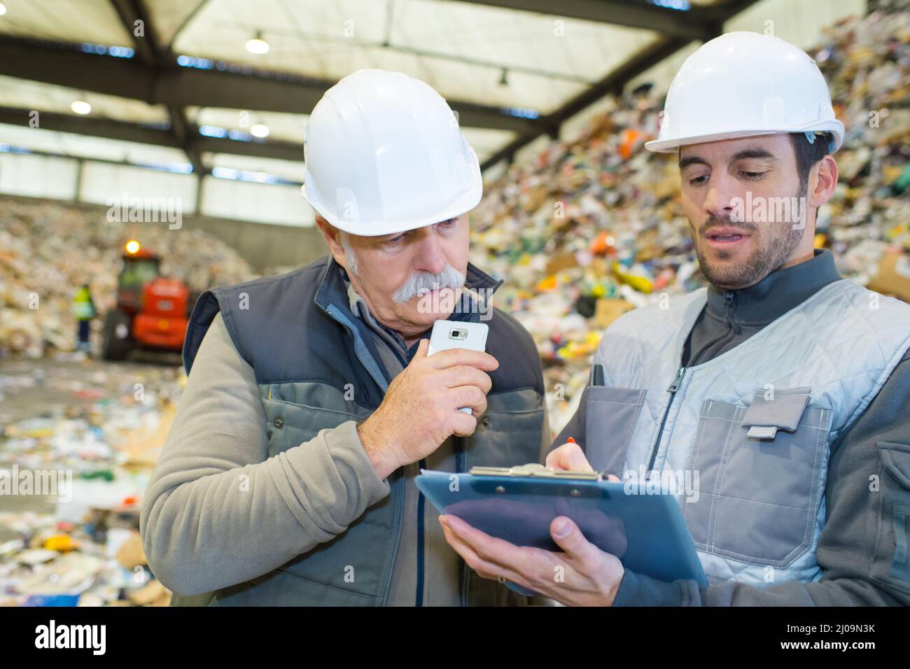 Recycling center forklift hi-res stock photography and images - Alamy