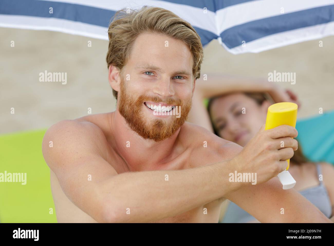 Man Applying Suntan Lotion Woman High Resolution Stock Photography and ...