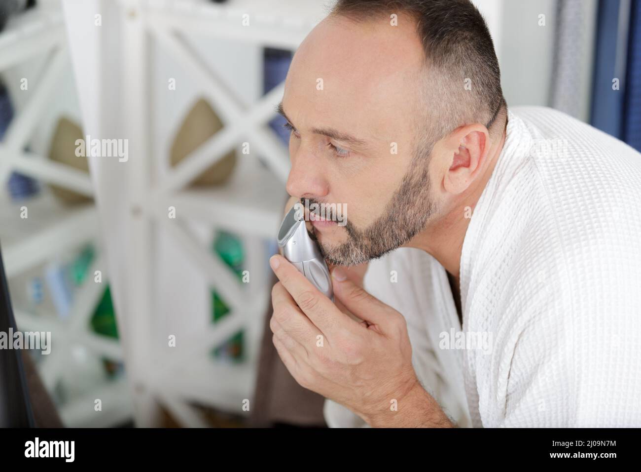 Ad electric razor hi-res stock photography and images - Alamy