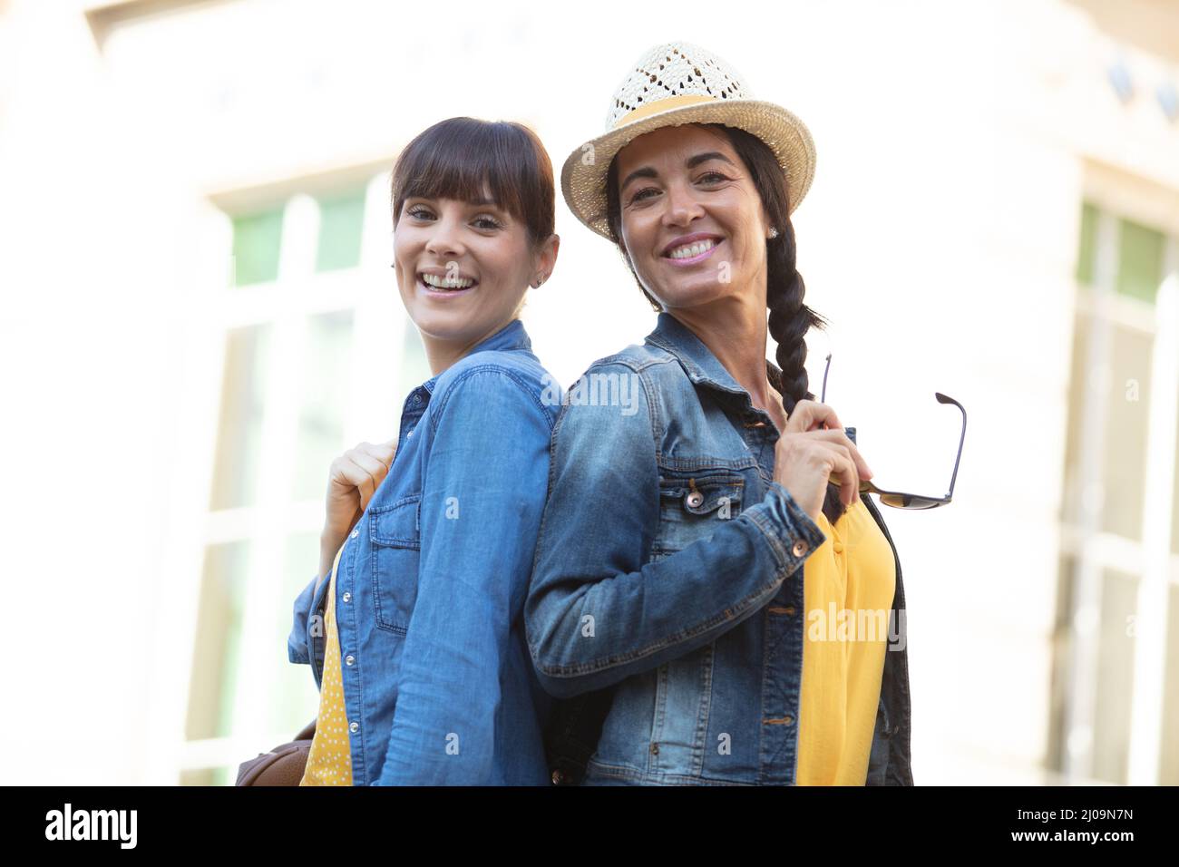 happy brightful positive moments of two stylish girls in street Stock ...
