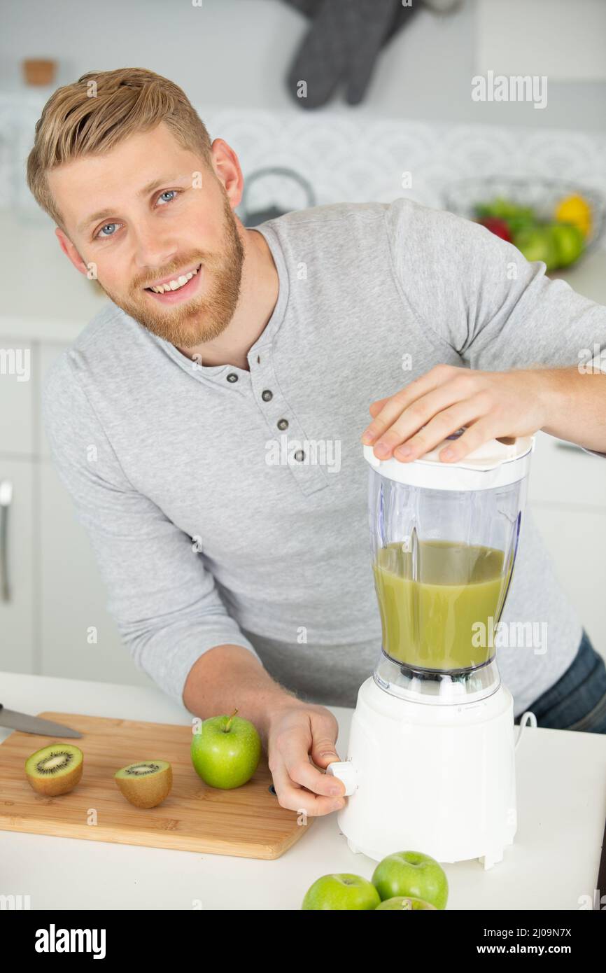 Bearded young muscular man making hi-res stock photography and images ...