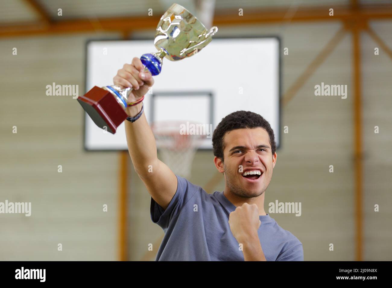 Award ceremony college basketball trophy hi-res stock photography and ...