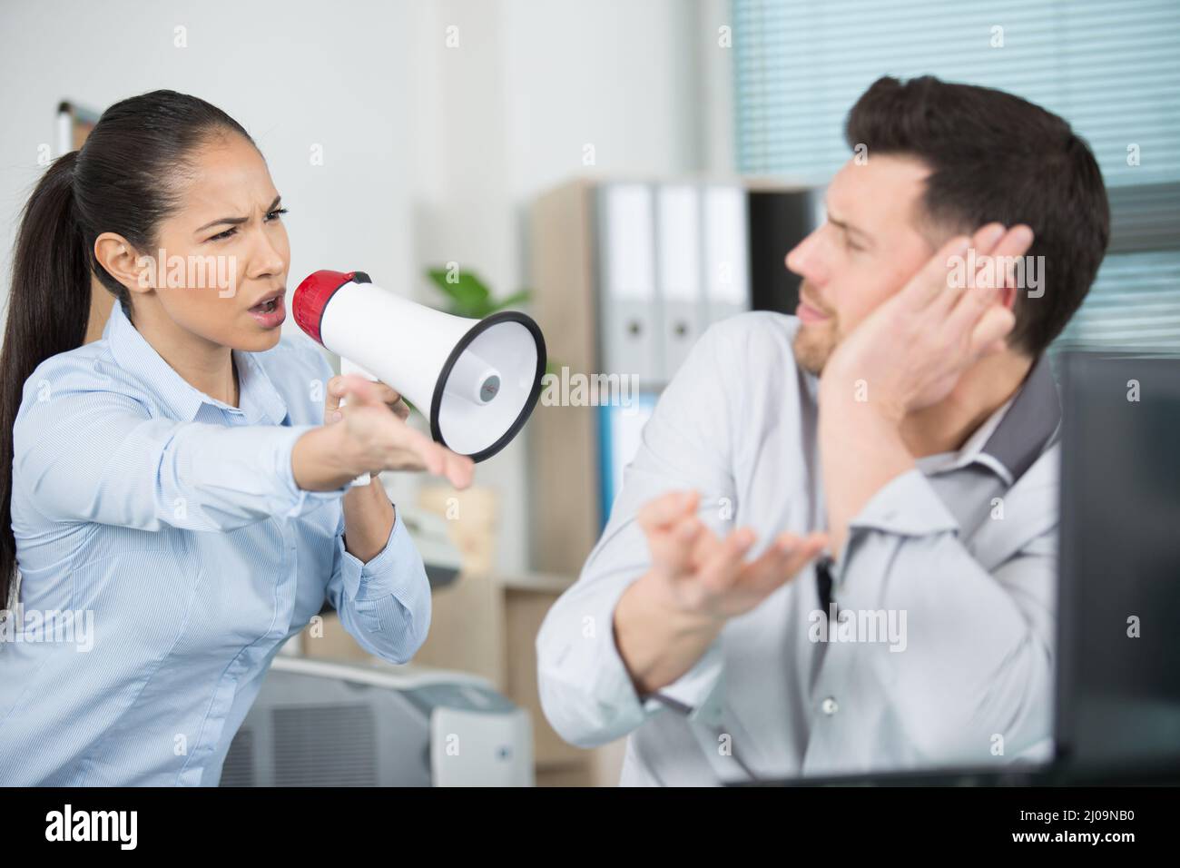office conflict between man and woman Stock Photo - Alamy