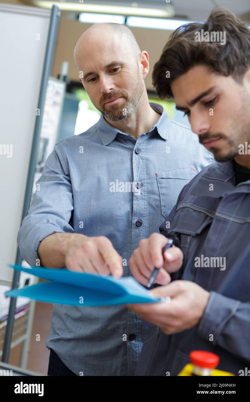store workers working in a distribution warehouse Stock Photo - Alamy