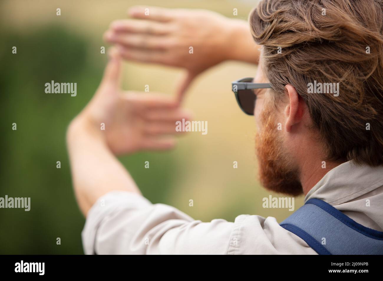 man drawing a square with his hands Stock Photo - Alamy
