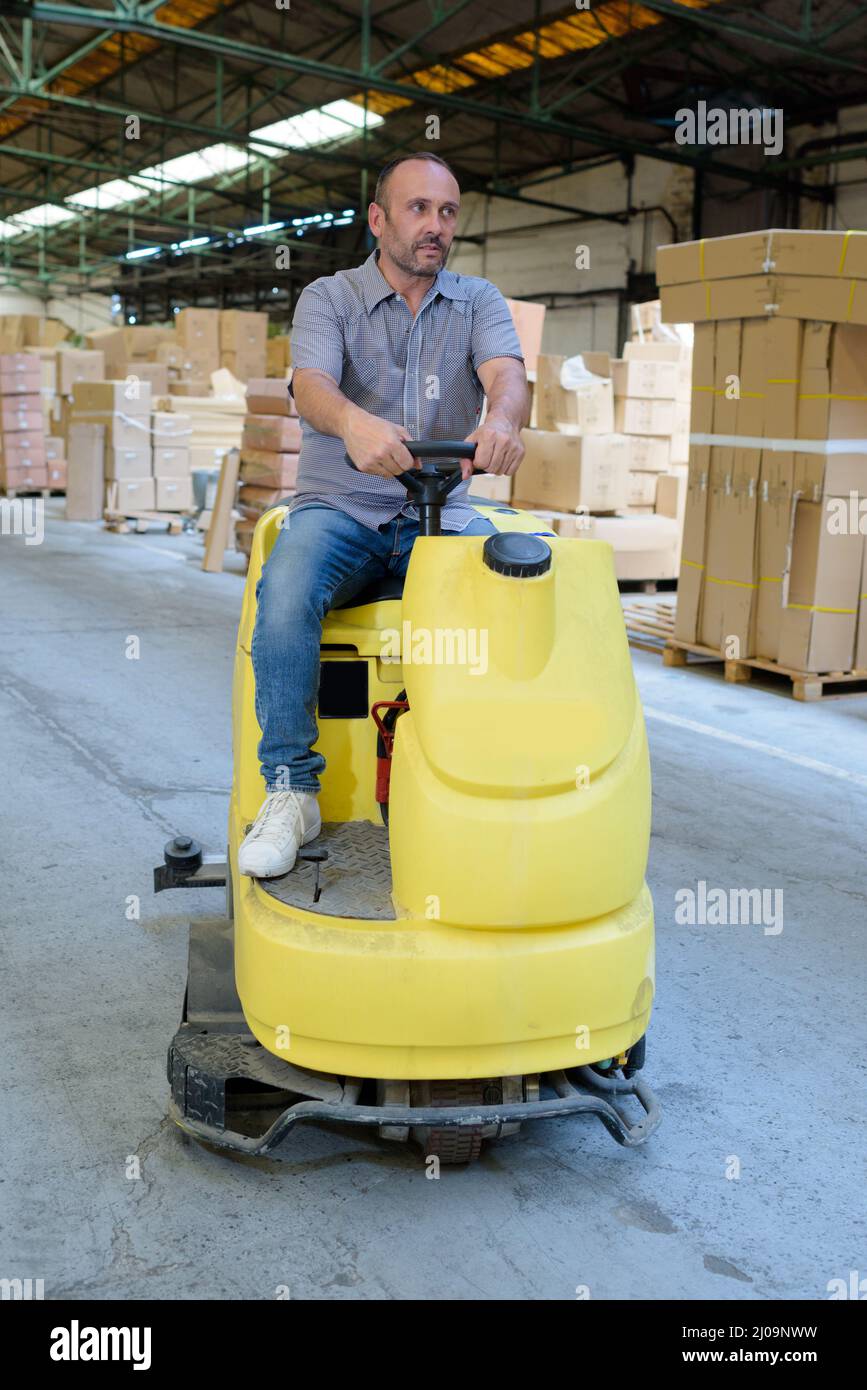 portrait of an operator with cleaning machine Stock Photo - Alamy
