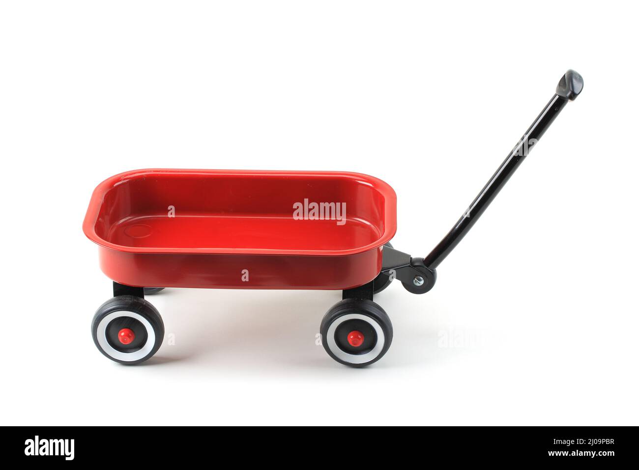 Red wagon on white background Stock Photo - Alamy