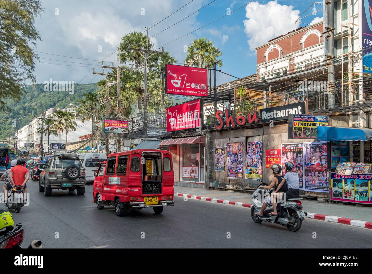 Urban scene from Thawewong Road along Patong Beach. Pastong is normally ...