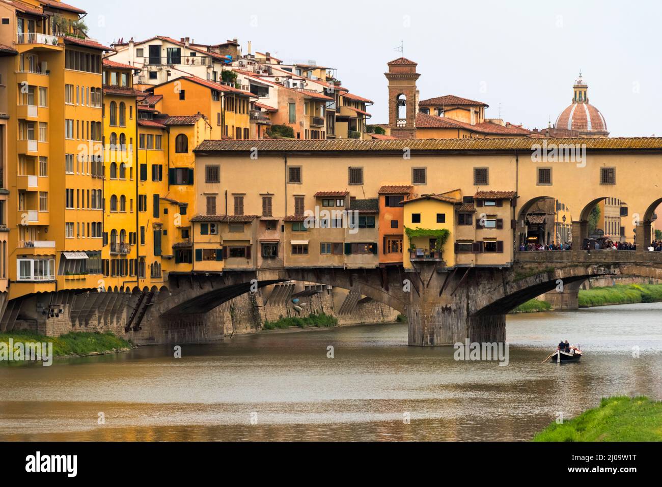 Ponte Vecchio, a medieval bridge over the Arno River, Florence, Tuscany ...