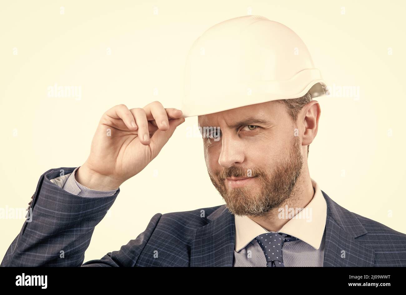 successful man with greeting gesture. entrepreneur in protective helmet ...