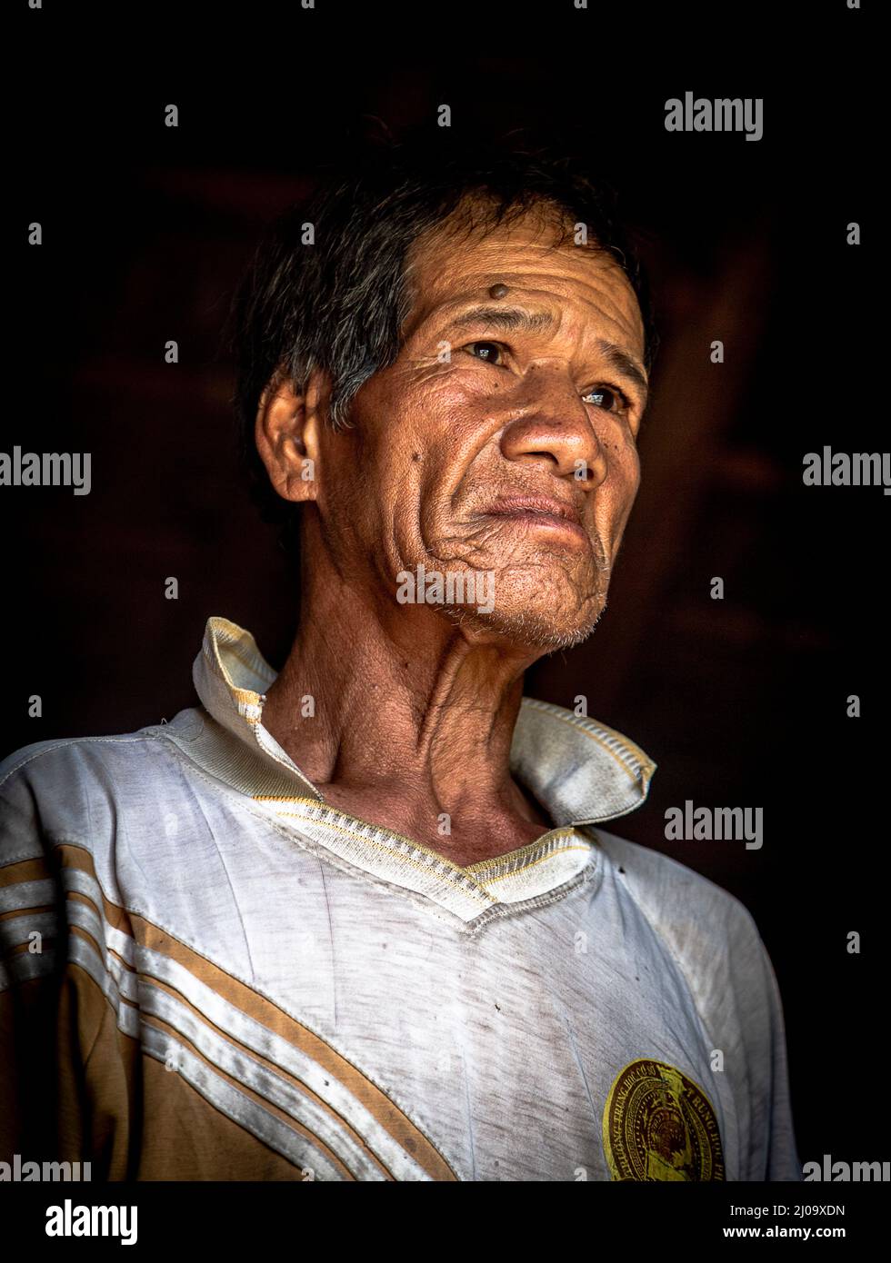 Elder man's portrait in the village Stock Photo - Alamy