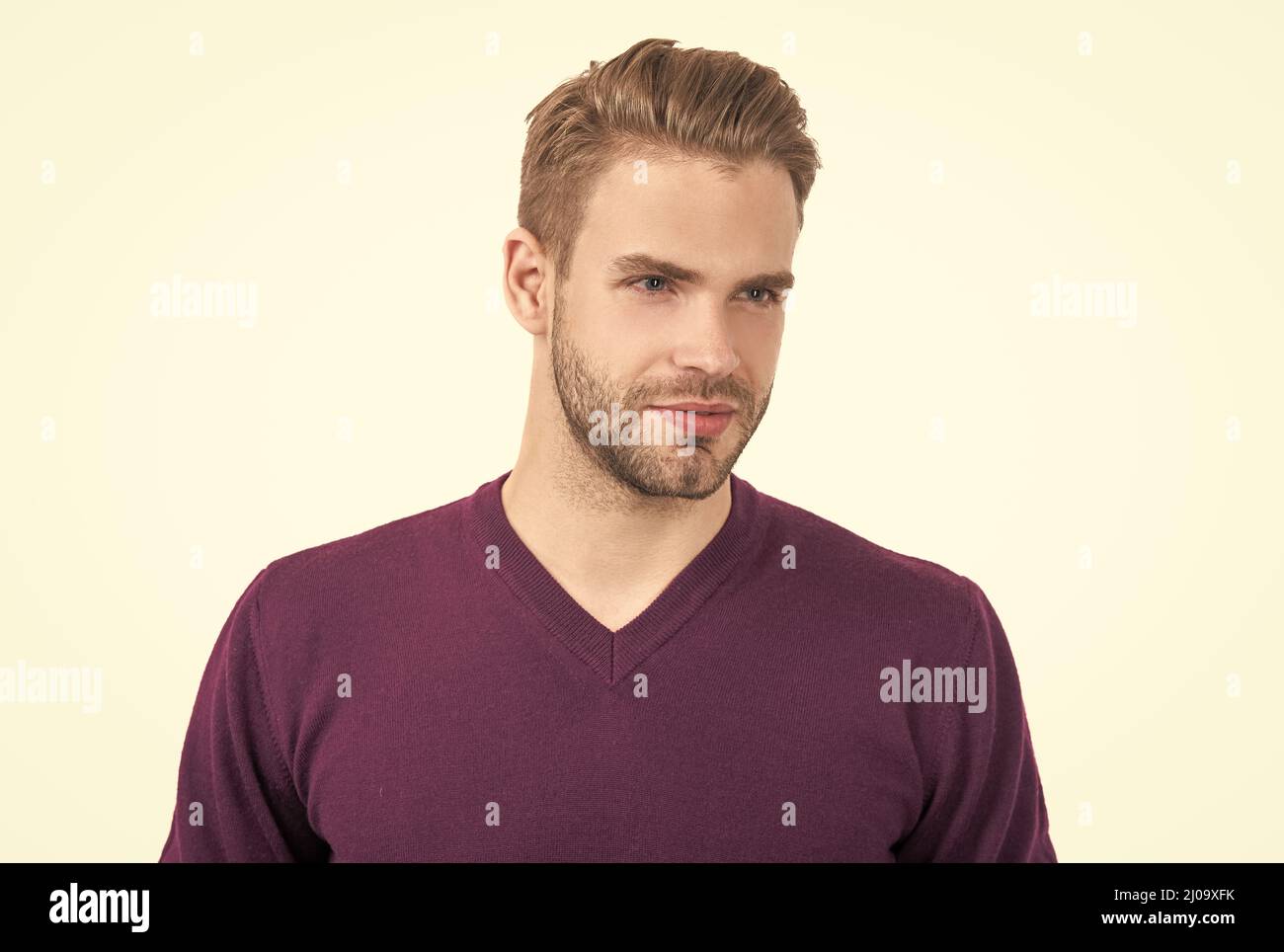 Handsome caucasian guy with unshaven face and stylish hair isolated on ...