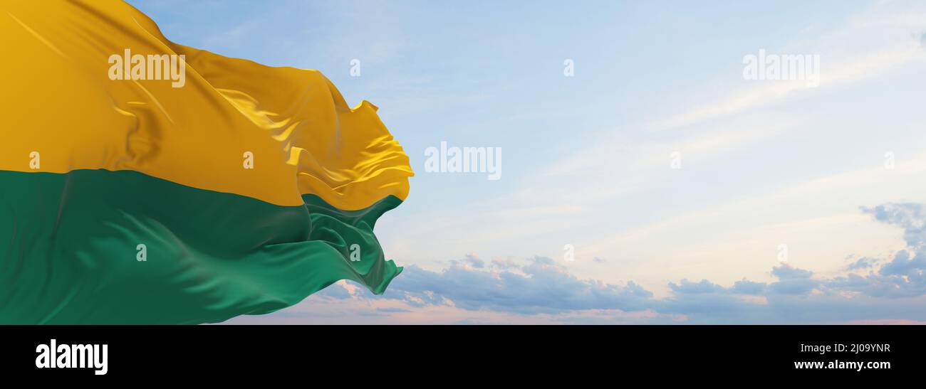 flag of The Hague , Netherlands at cloudy sky background on sunset ...