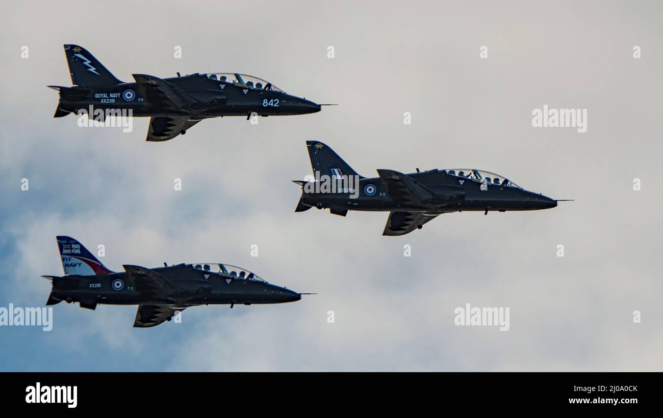 Black Royal Navy Hawk aircraft over Portsmouth Harbour, UK on the 17th ...