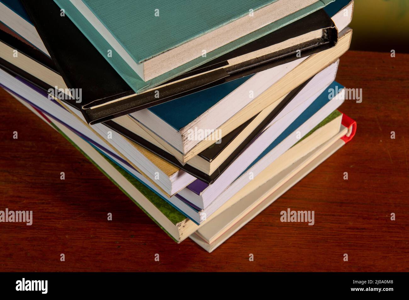 Close-up of background stack of old used books. Pile of vintage old ...