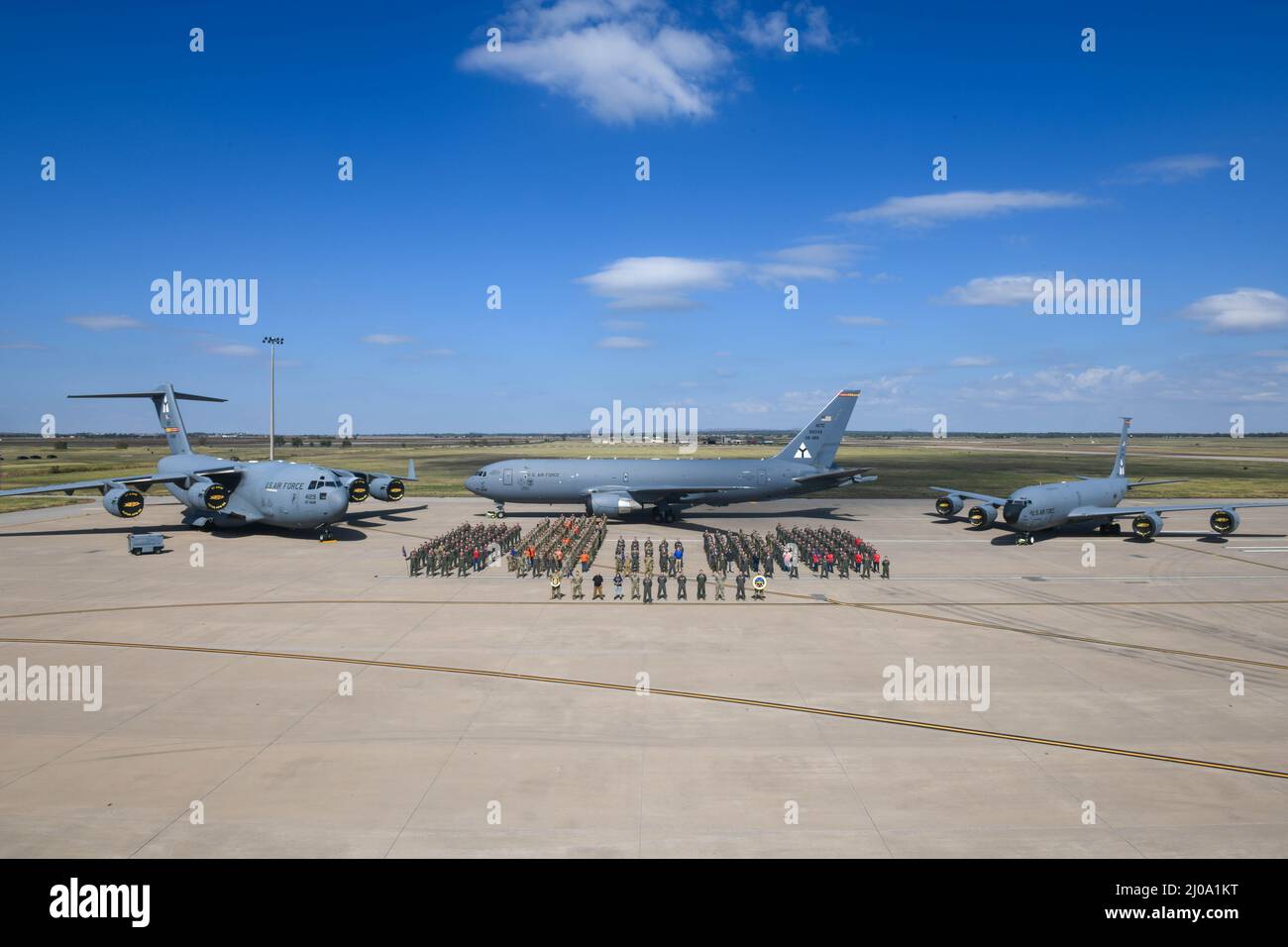 Members from the 97th Operations Group (OG) pose for a squadron photo ...