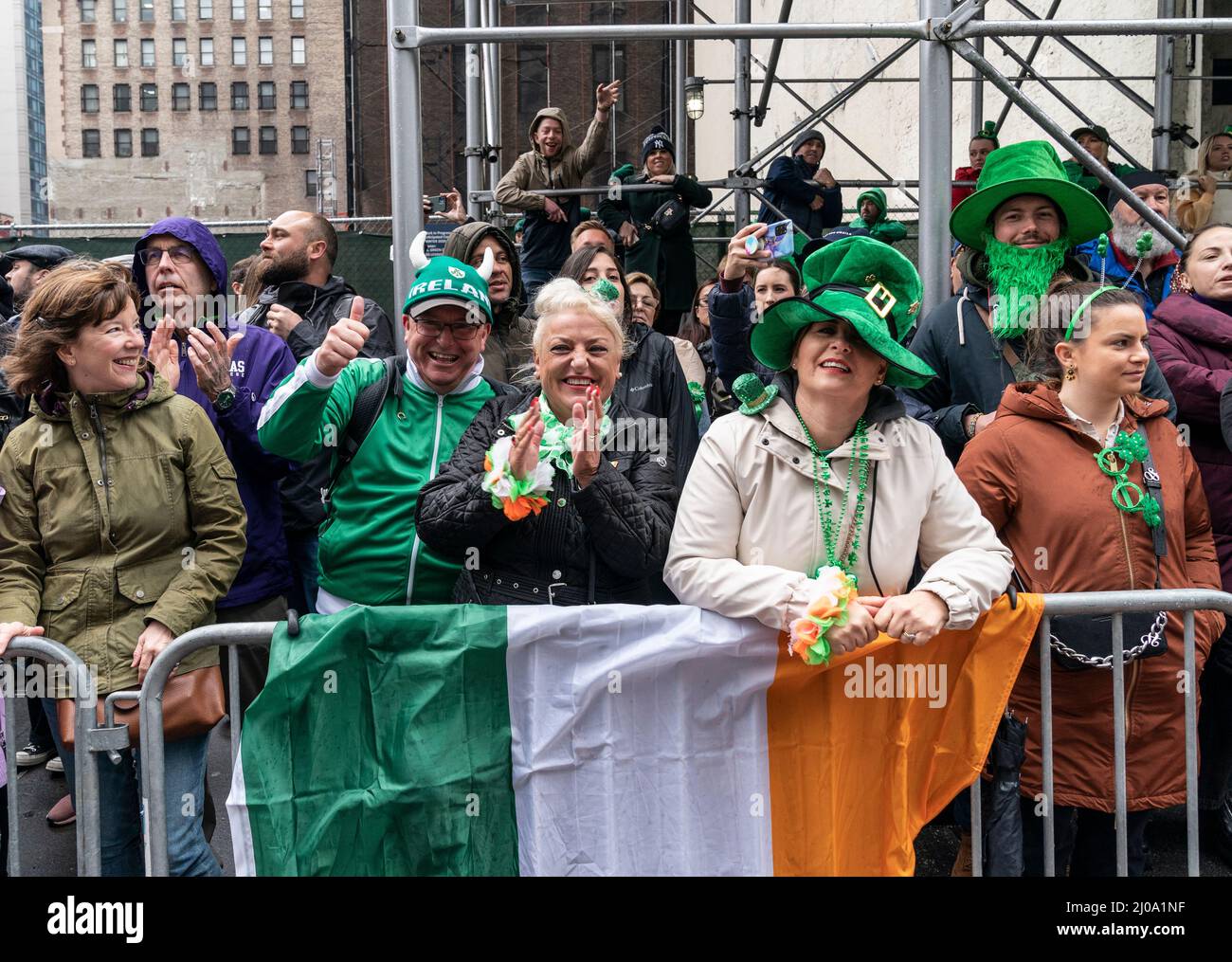New York, NY - March 17, 2022: Thousand spectators lined up along 5th ...