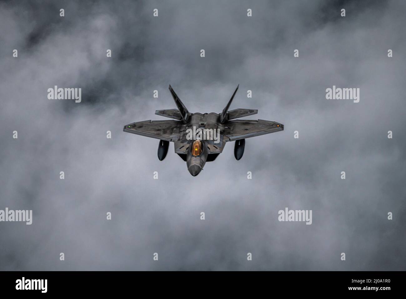 An F-22 Raptor, assigned to Alaska NORAD Region, flies over the Gulf of ...