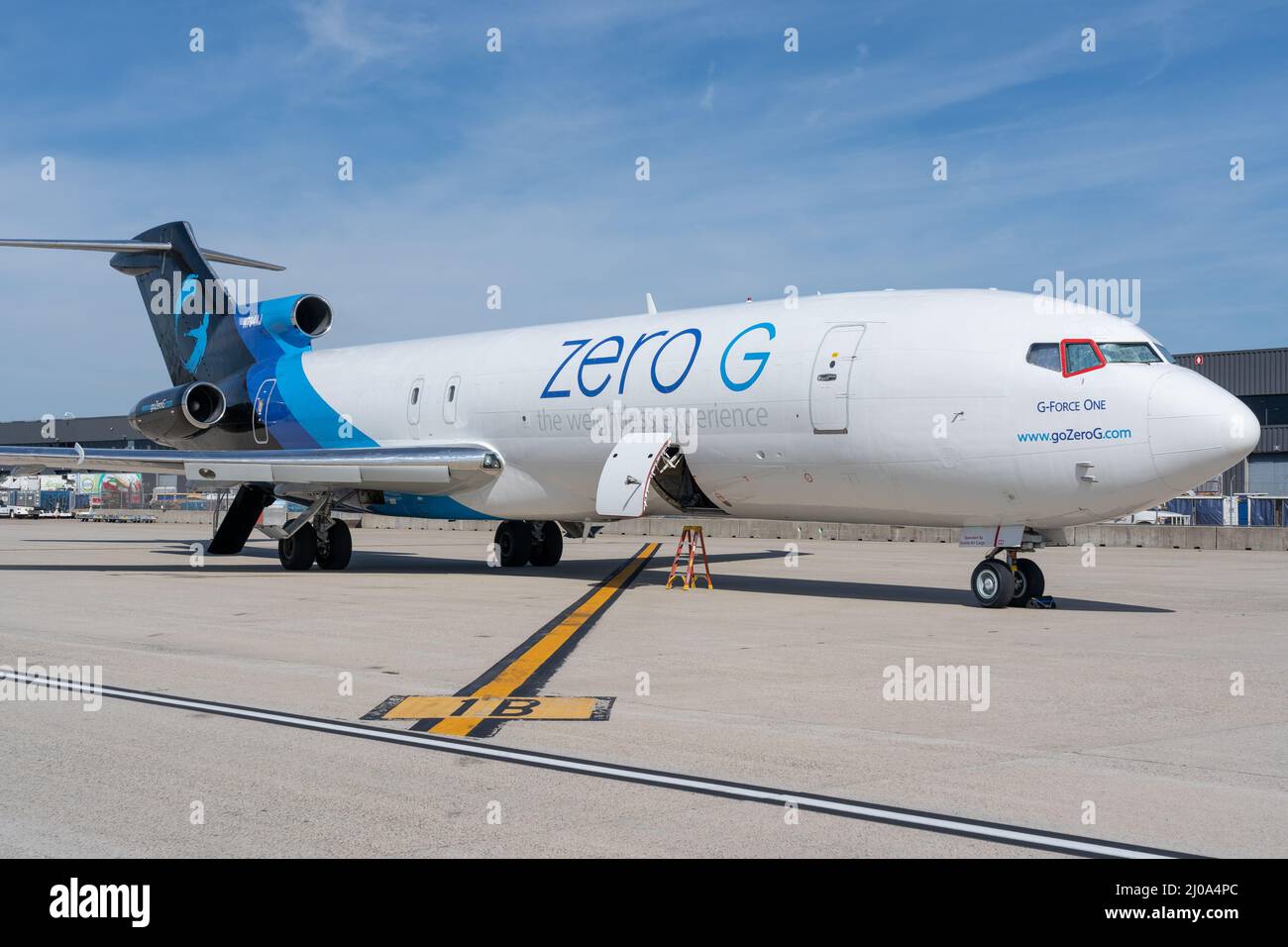 Zero G airplane parked at Dulles Airport against the blue sky at ...