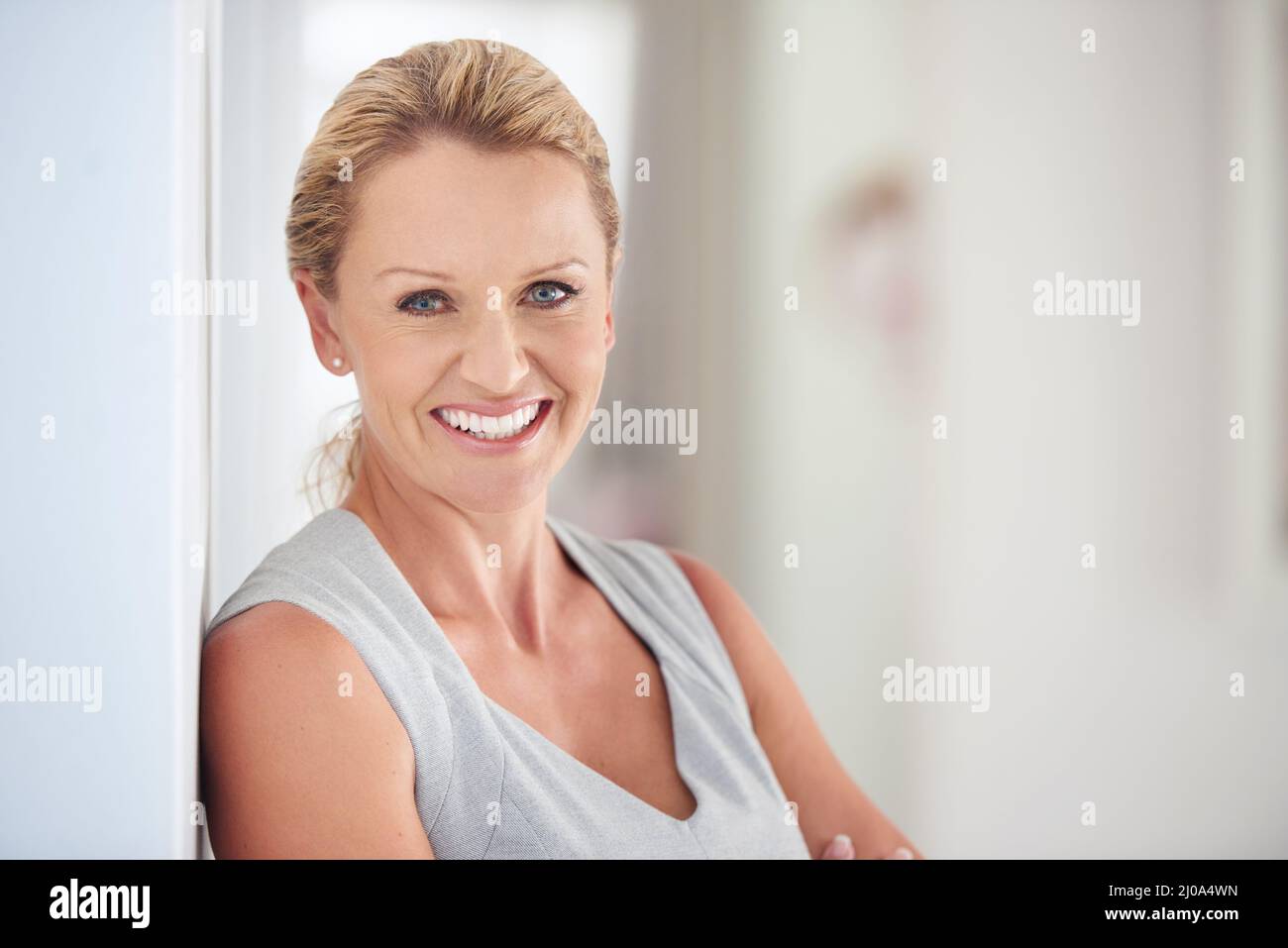 Success makes me smile. Cropped portrait of an attractive businesswoman ...