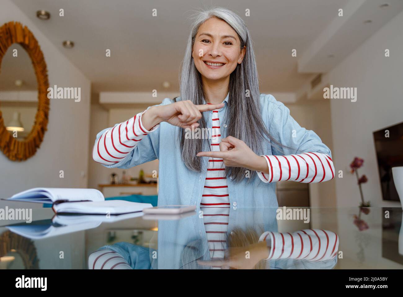 Woman female gesture sign hi-res stock photography and images - Alamy