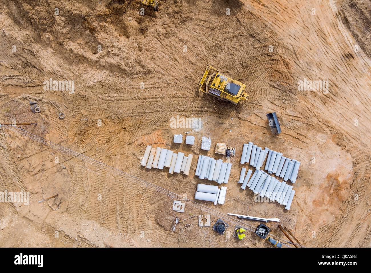 Large new concrete circular pipes lying down for the construction of ...