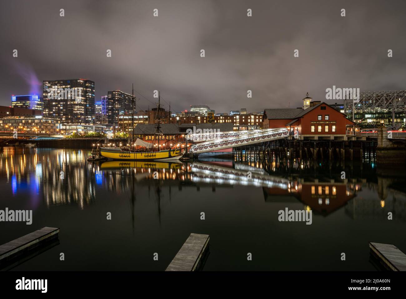 Beautiful nightscape of the waterfront buildings in downtown Boston ...