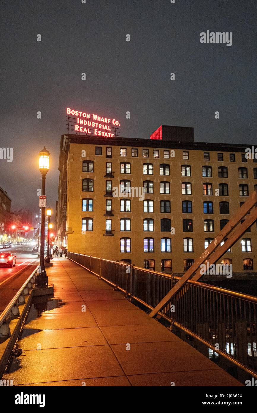 Beautiful nightscape of the waterfront buildings in downtown Boston ...