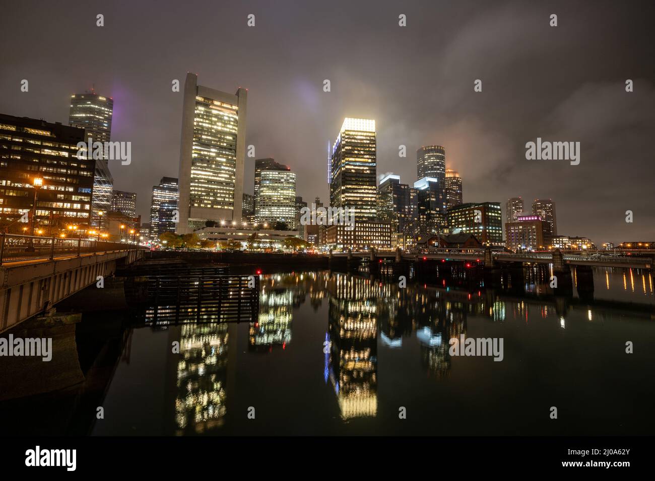 Beautiful nightscape of the waterfront buildings in downtown Boston ...