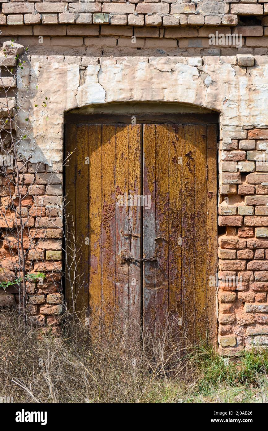 An old rustic door of a Indian railway quarter from the British ...
