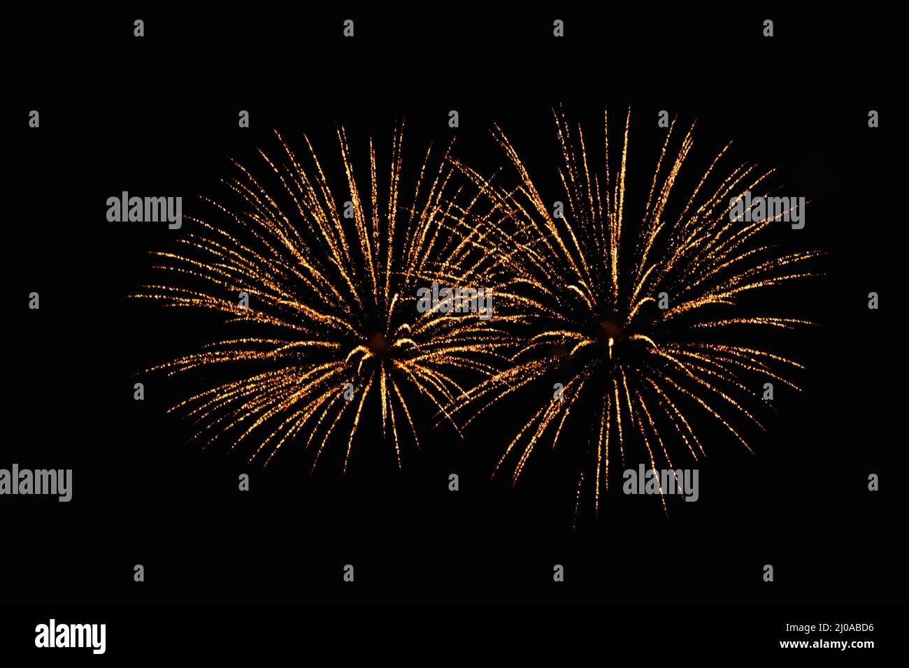Fireworks, sparks, and firecrackers light up the night sky Stock Photo ...