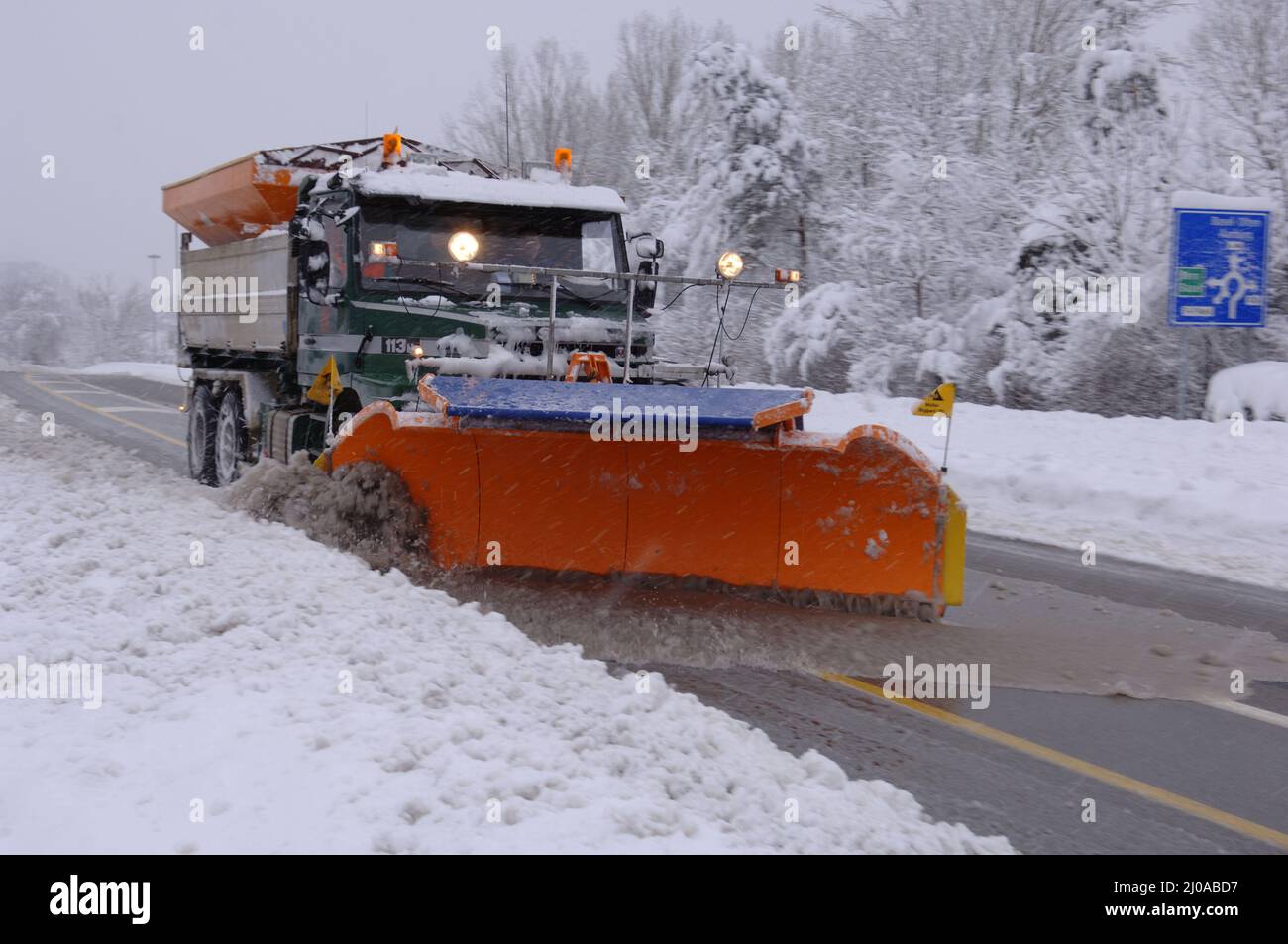 Snow plough on motorway Stock Photo - Alamy