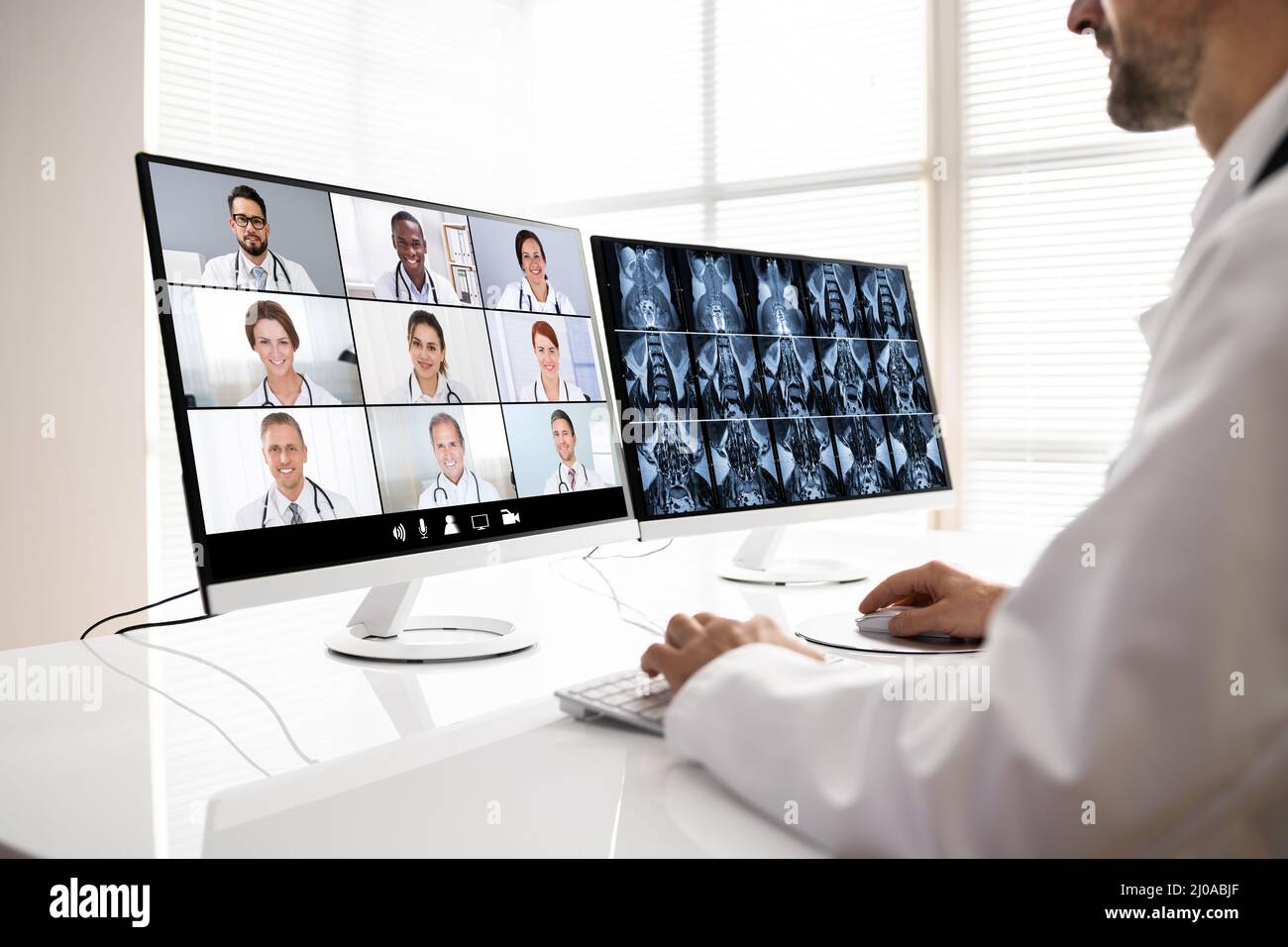 Radiologist Doctor Video Chat Conference Online In Clinic Stock Photo ...