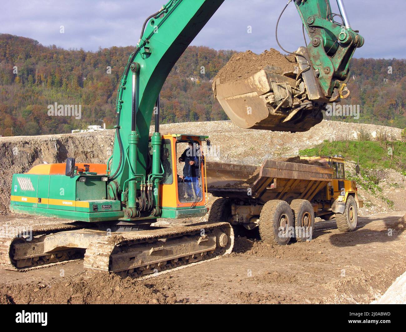 Excavator on site Stock Photo - Alamy