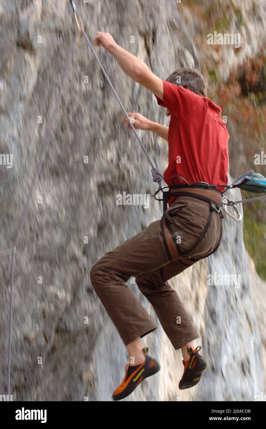 Fall during sport climbing Stock Photo - Alamy
