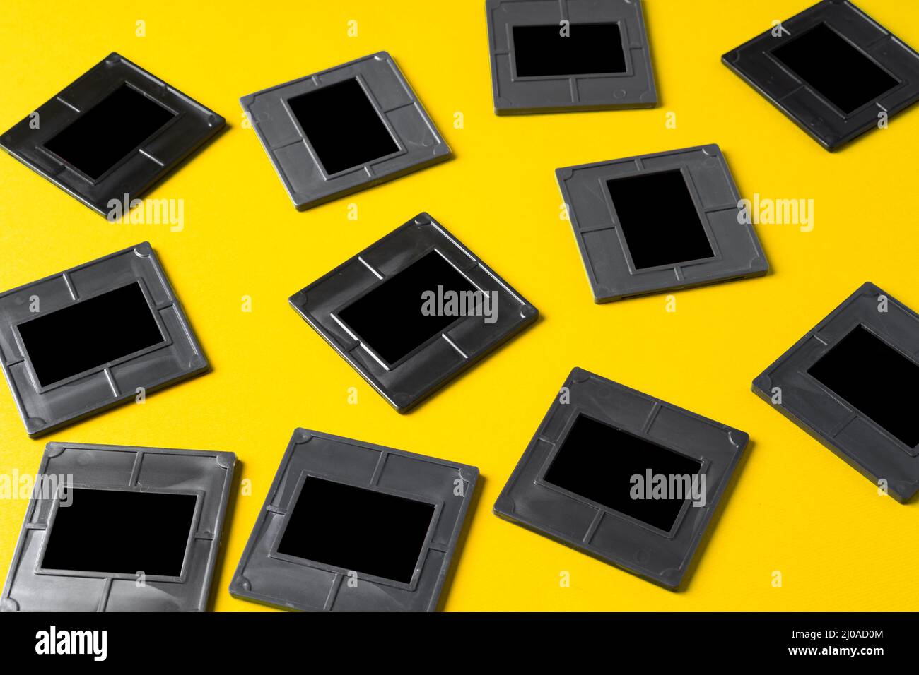 Photography empty slide frames on yellow background Stock Photo - Alamy