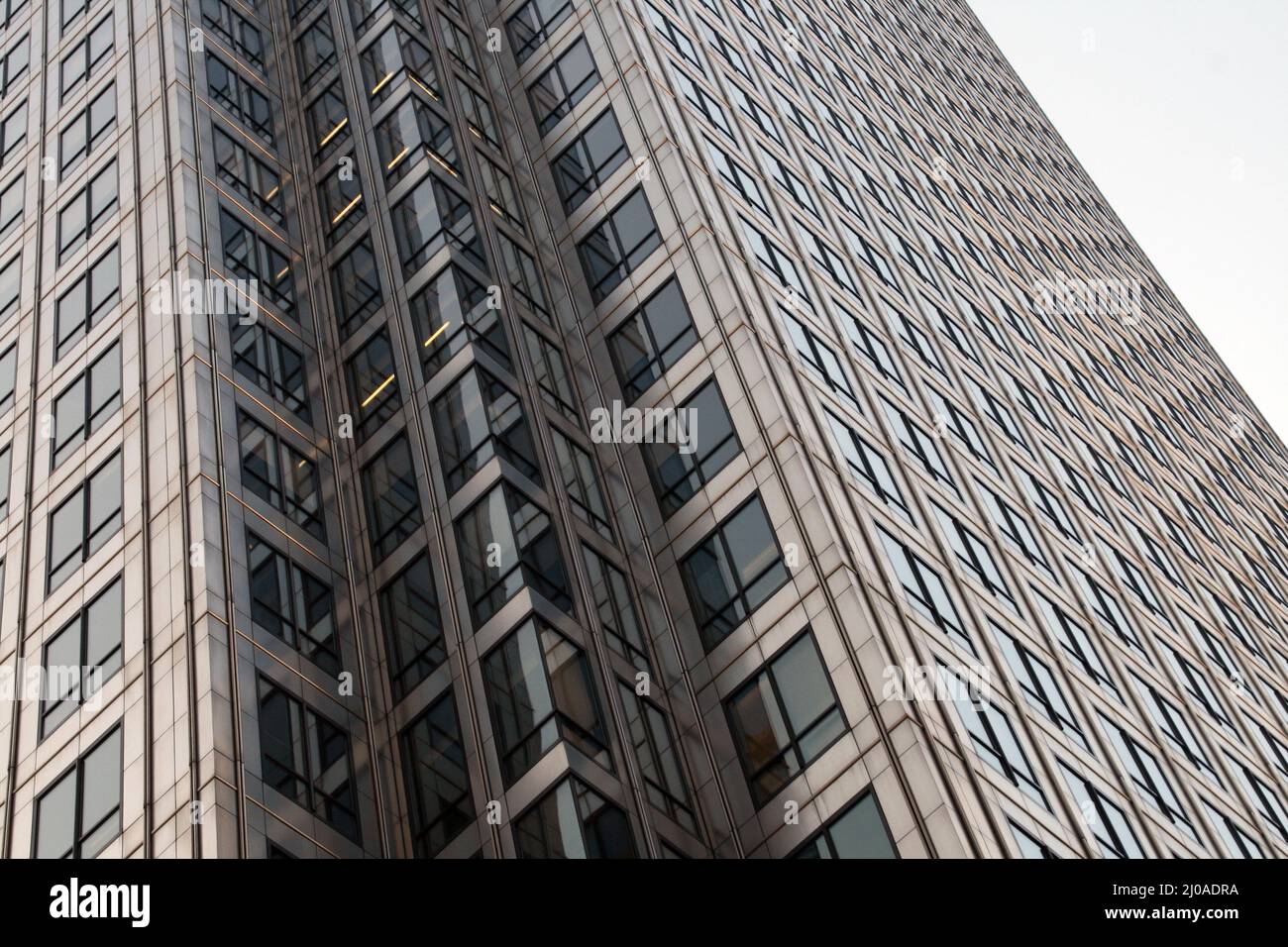 Modern high-rise building with glass windows in London Stock Photo - Alamy